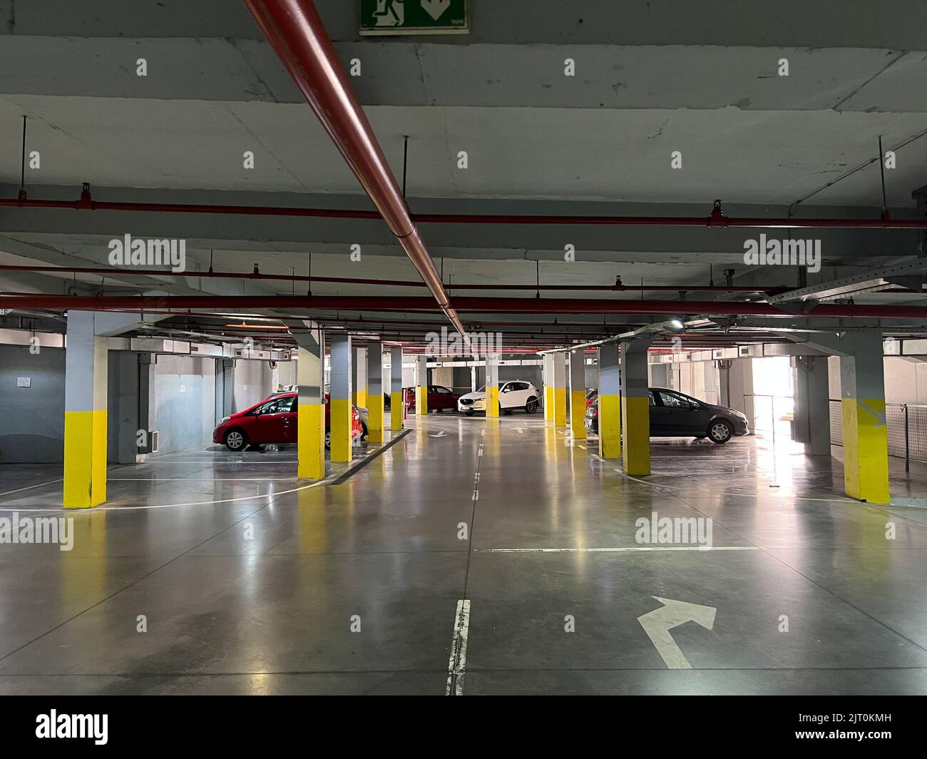 Budva, Montenegro - 27.08.22: Cars stand on a large concrete ...