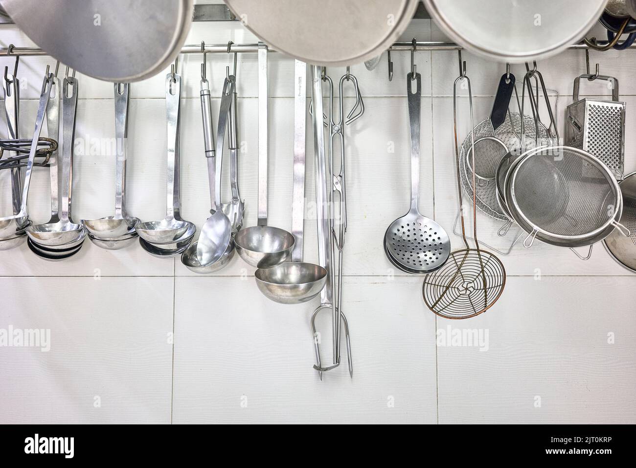 Kitchen Ladles, Cooking Skimmers and others Cookware of a professional ...