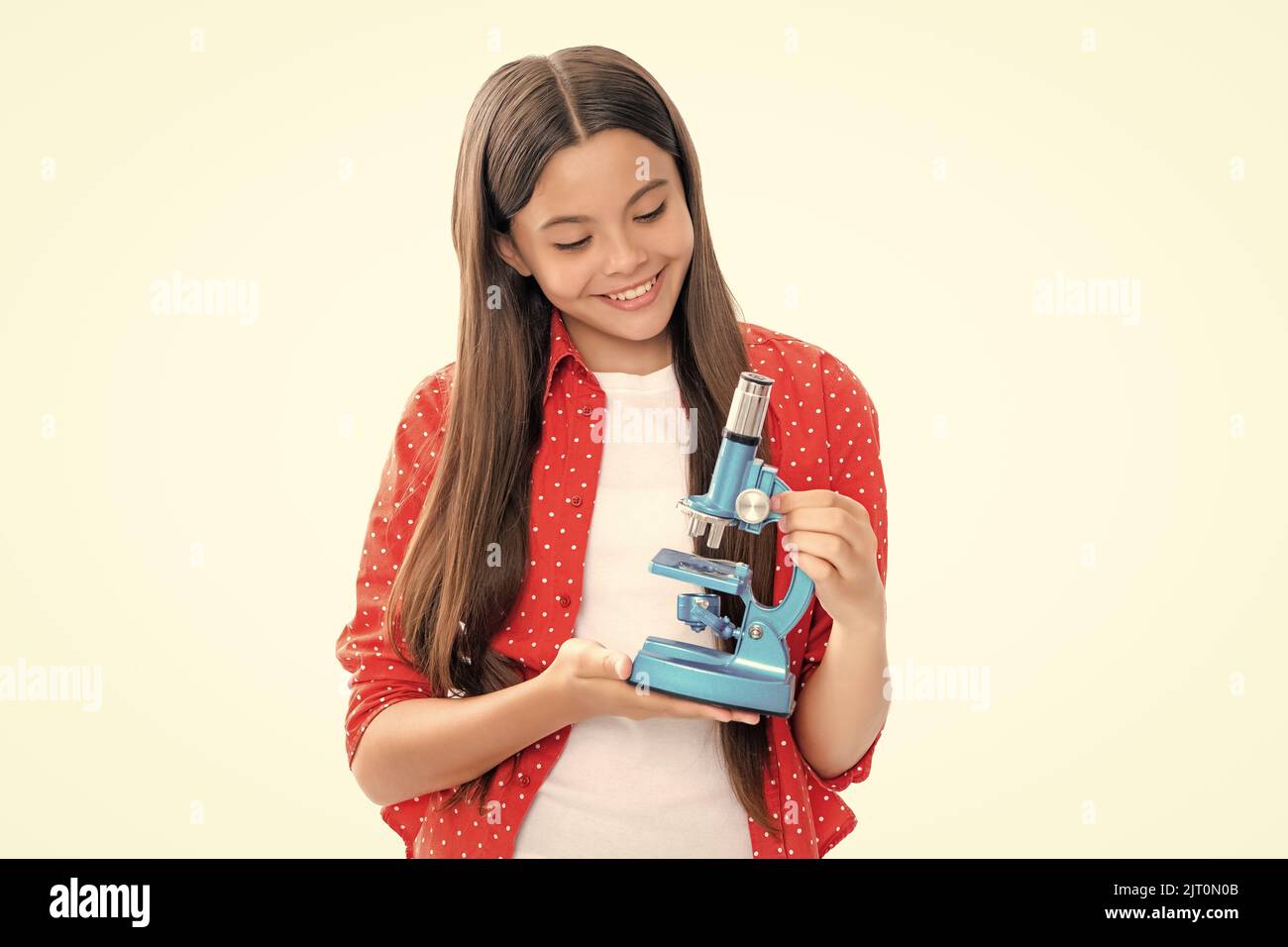 Teenager school girl with microscope. Back to school. Girl scientist ...