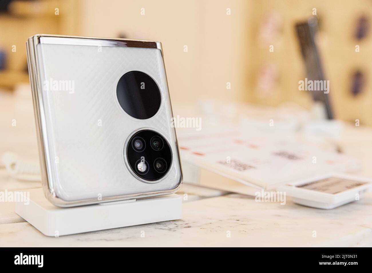 Huawei P50 foldable cell phone seen on display inside a Huawei store in ...