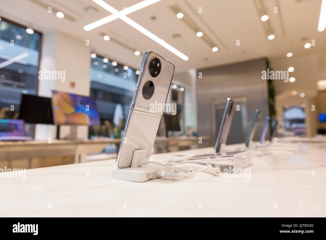 Huawei P50 foldable cell phone seen on display inside a Huawei store in ...