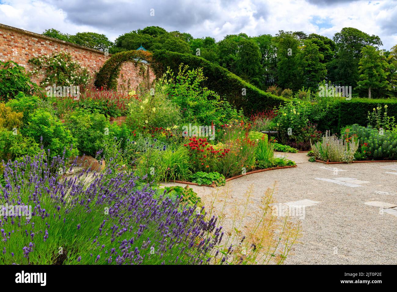 The well stocked and colourful borders in the Cottage Garden in the ...