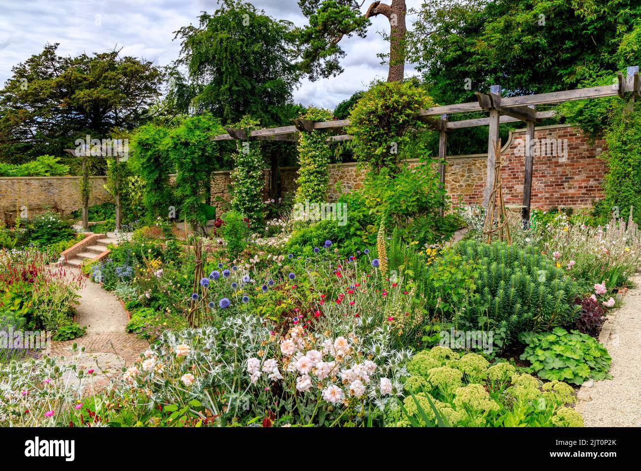 The well stocked and colourful borders in the Cottage Garden in the ...