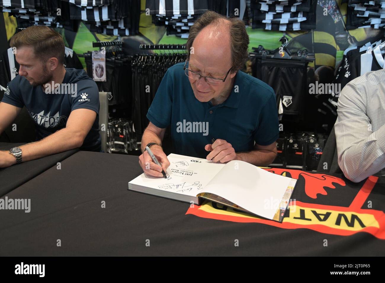 Historian Geoff Wicken signs his book written about 100 years of ...