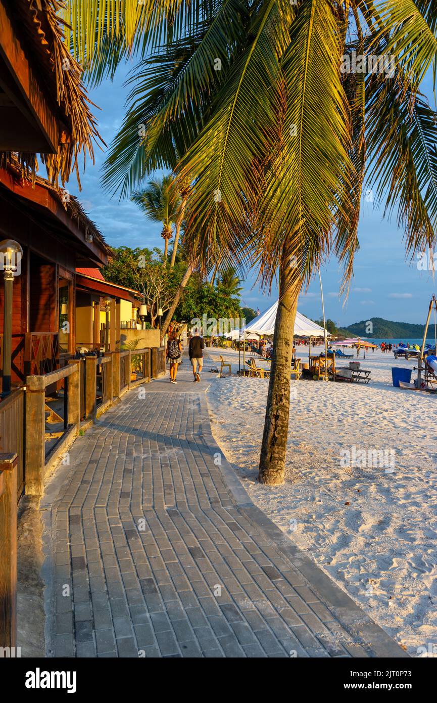The Seafront walkway at sunset on Chenang Beach, Langkawi, Malaysia ...