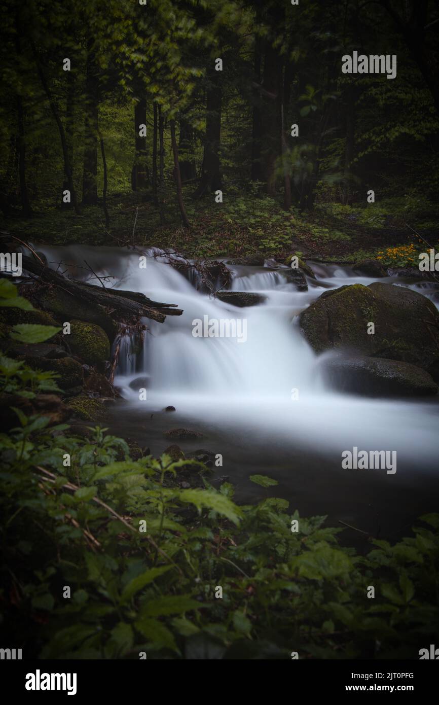 Famous Satiny waterfalls. Breathtaking, untouched nature around the water flowing down cascades ...