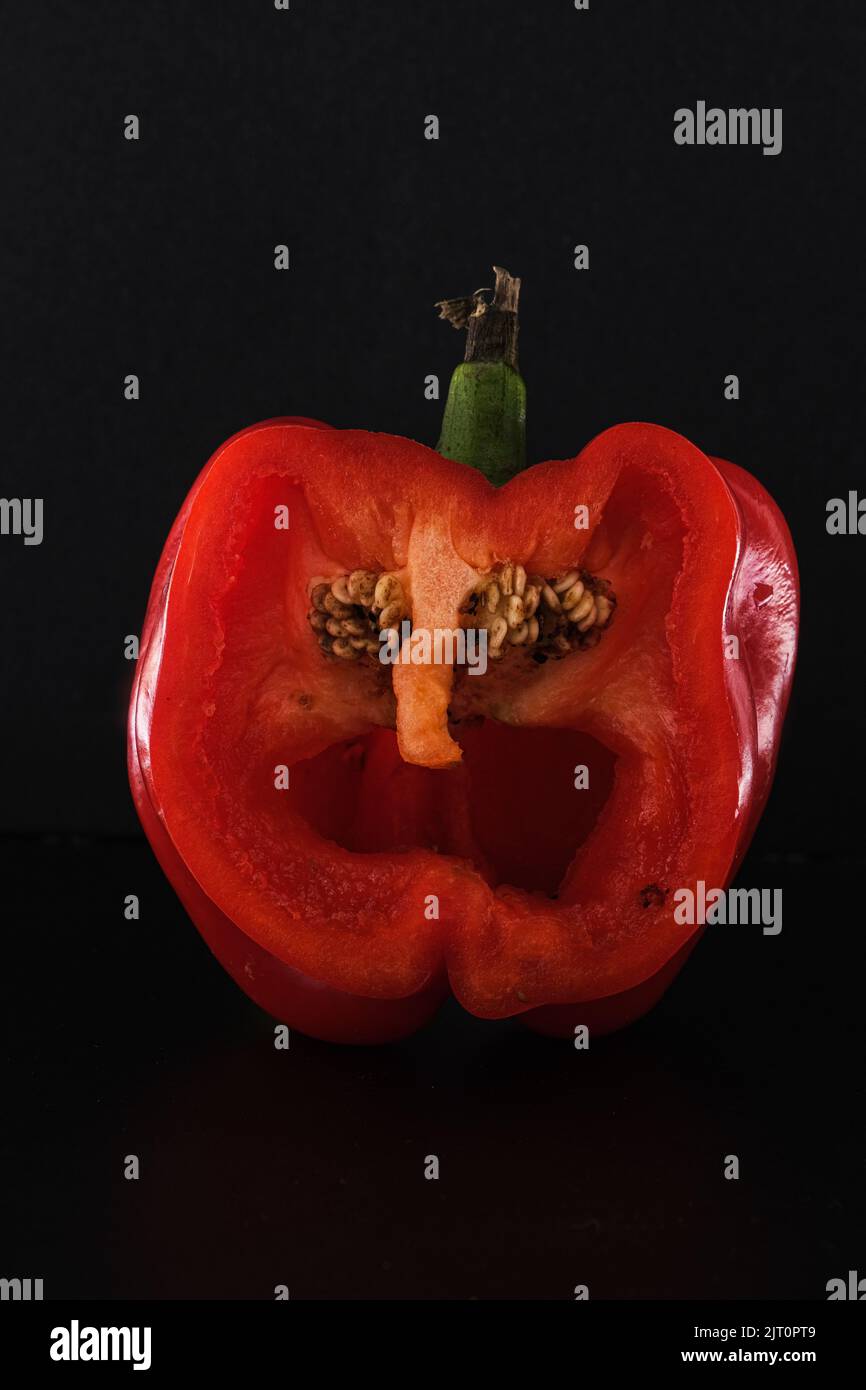 Angry face made from red bell pepper Stock Photo - Alamy