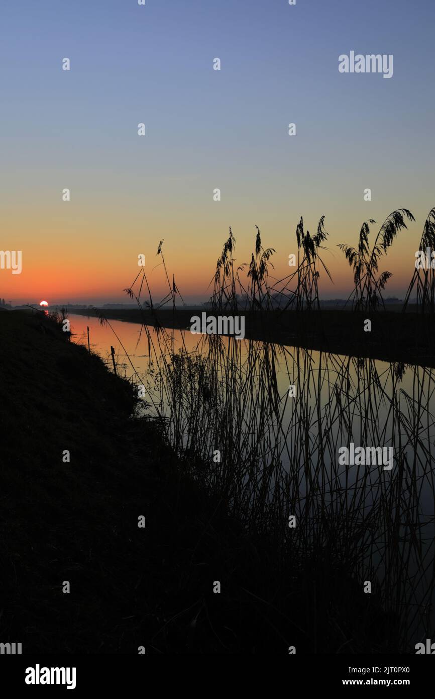sunset over the Old river Nene near March town; Cambridgeshire; England ...