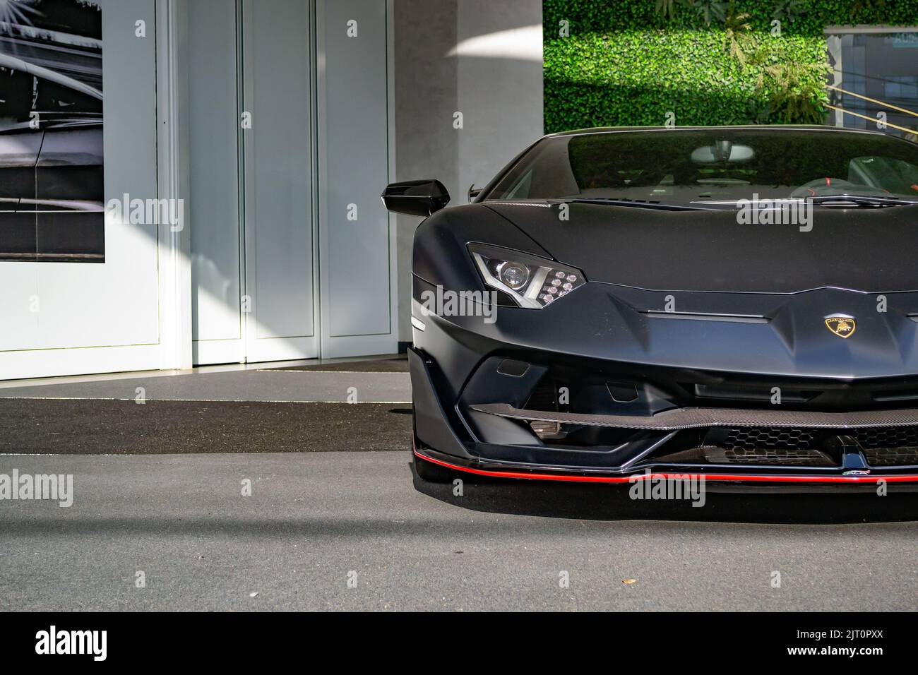A matte black Lamborghini Aventador SVJ luxury car Stock Photo - Alamy