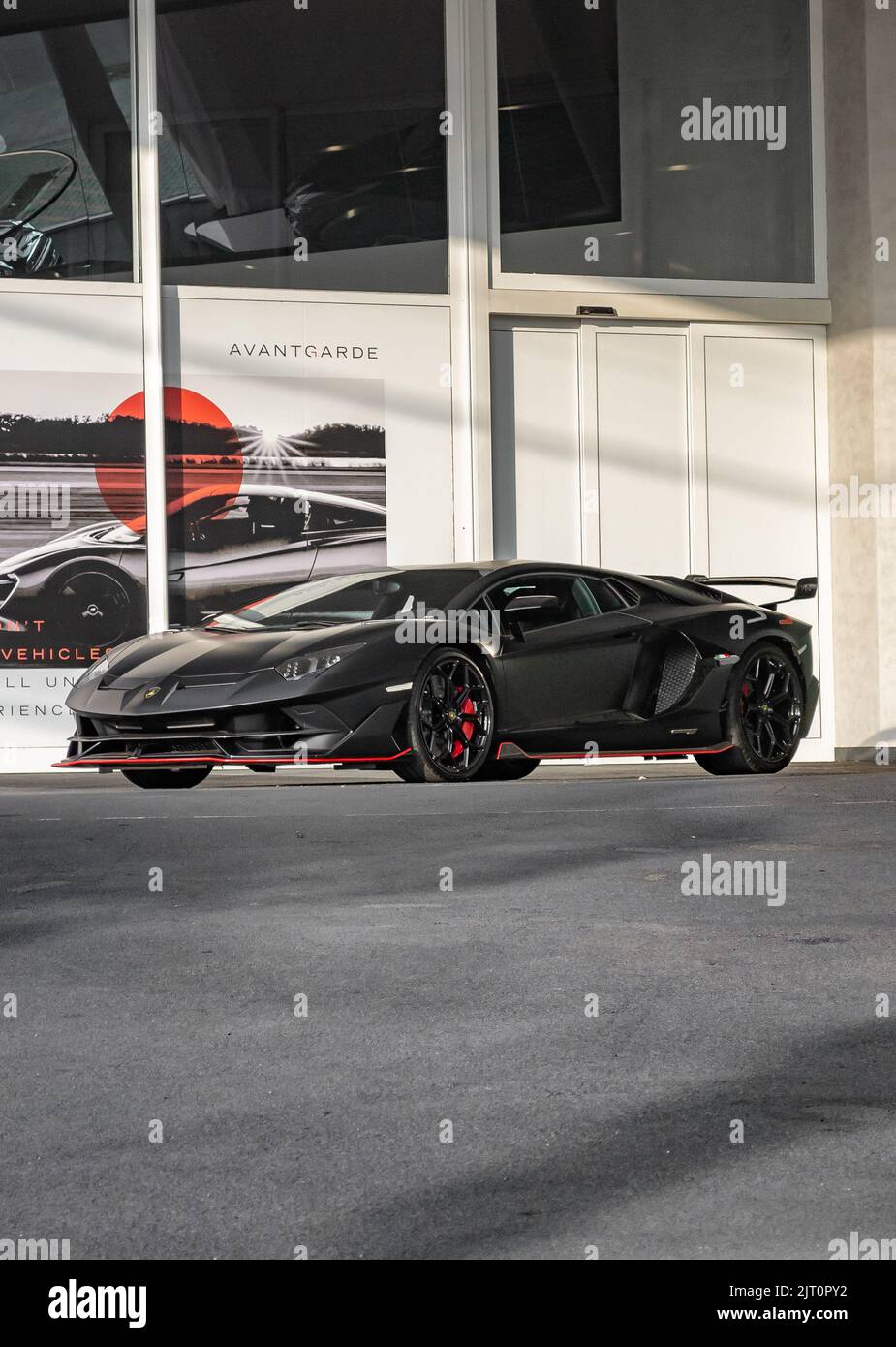 A matte black Lamborghini Aventador SVJ luxury car Stock Photo - Alamy