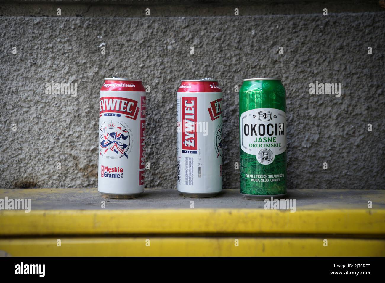 Three empty beer cans are seen on an electricity meter cabinet in ...