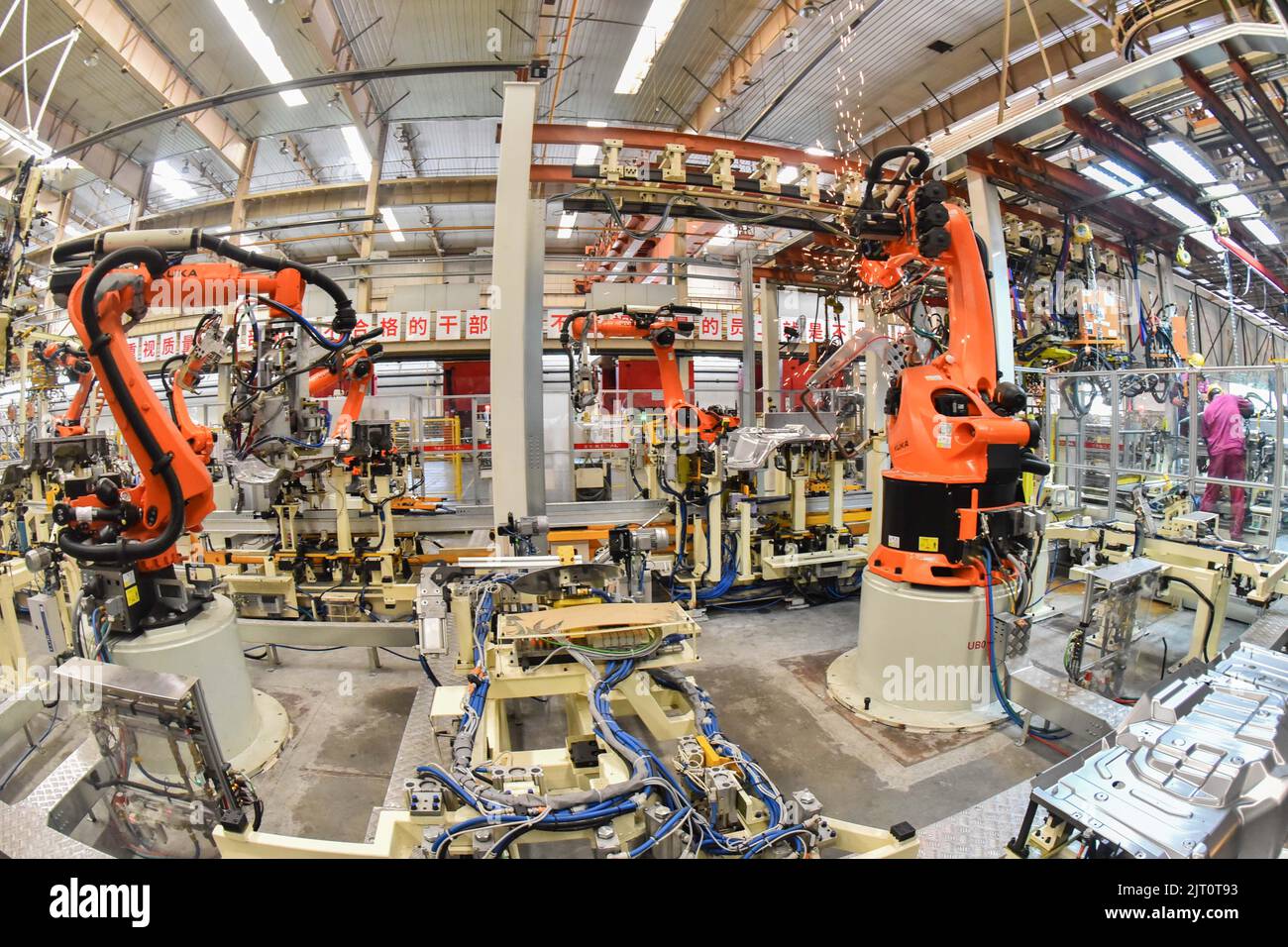 QINGZHOU, CHINA - AUGUST 27, 2022 - A manipulator works in a punching ...