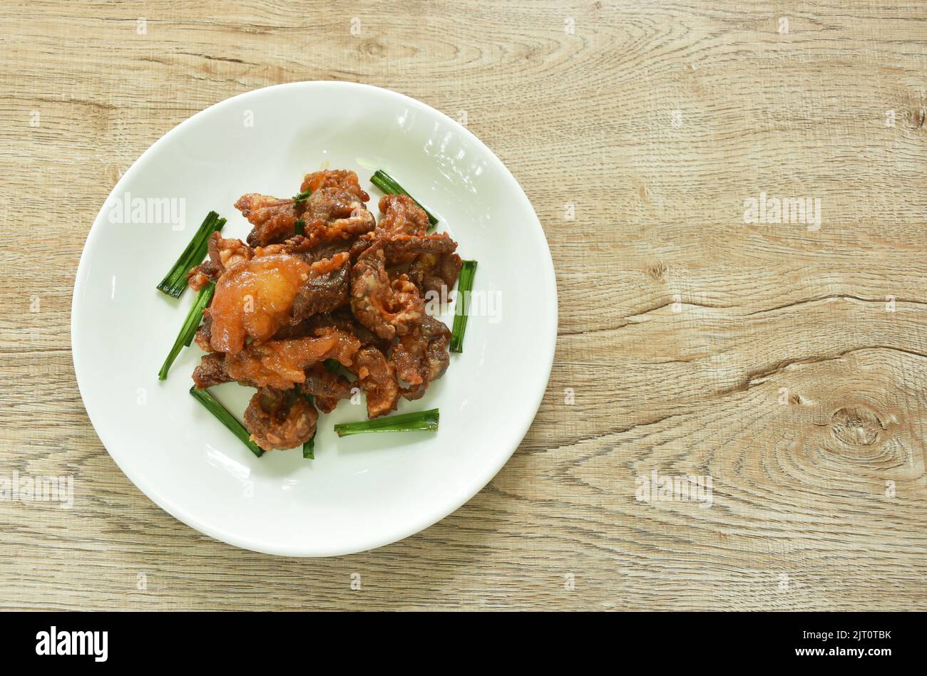 fried fermenting beef meat with pandan leaf on plate Stock Photo - Alamy