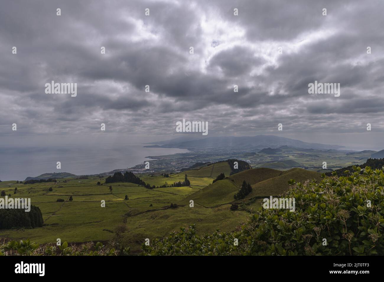 Mesmerizing view of sea surrounded by hills and green meadows on Sao ...