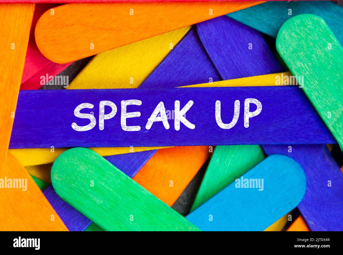 Speak up text on blue color wooden stick. Business culture concept ...