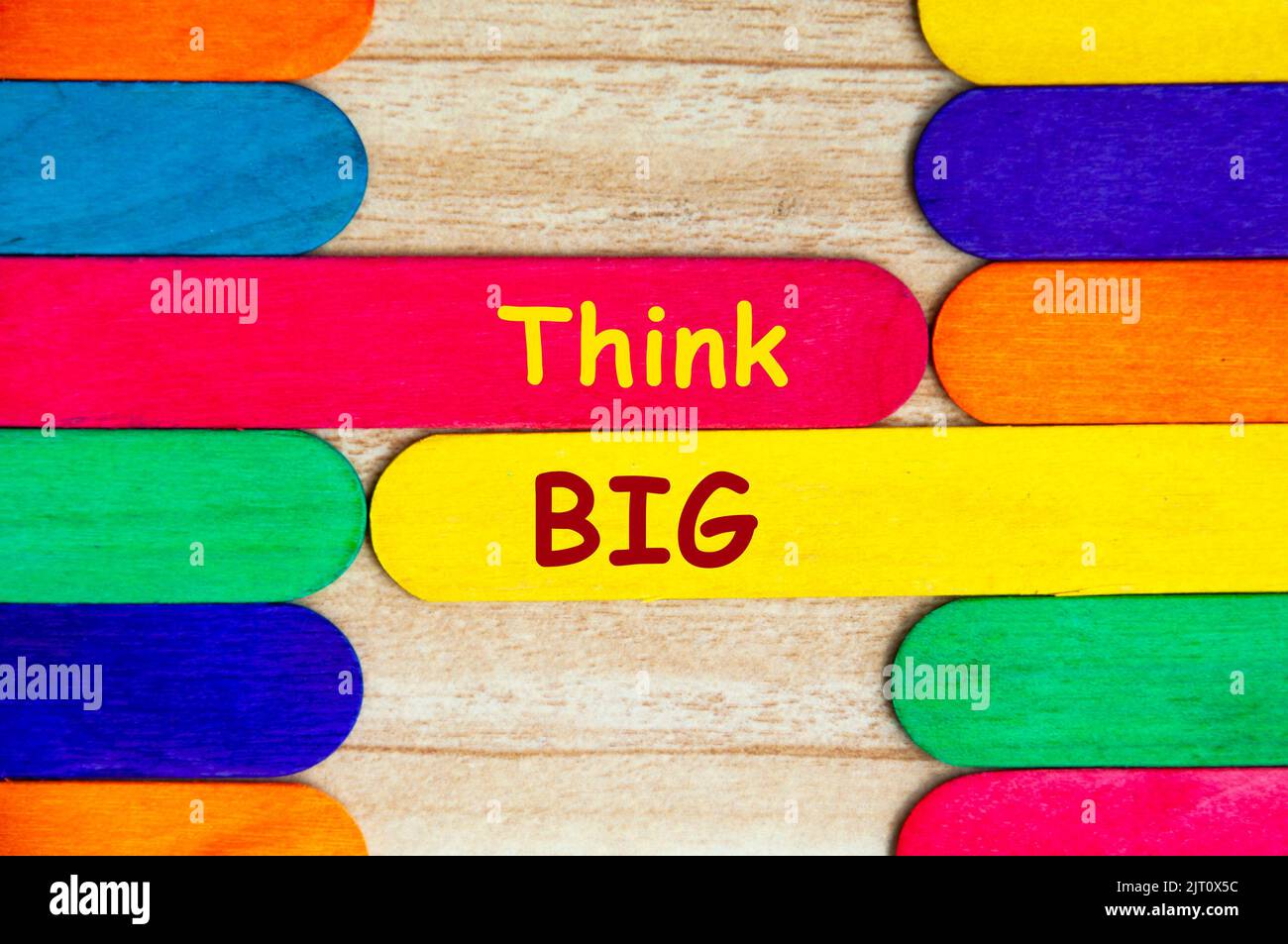 Think big text on colorful wooden stick. Motivational and business ...