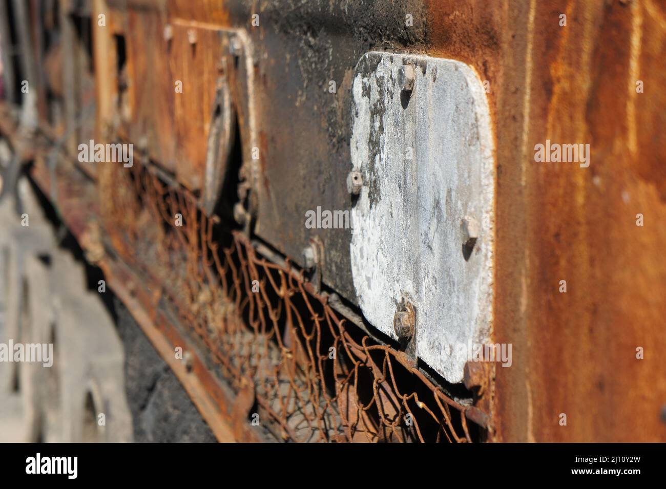 Close-up of details of old destroyed military equipment. Destroyed ...