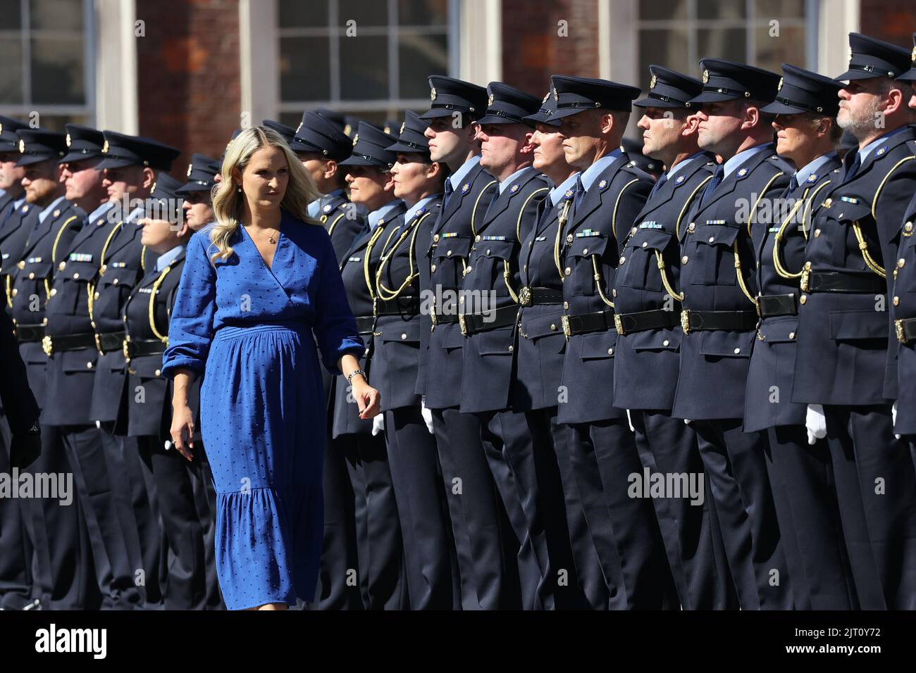 Minister for Justice, Helen McEntee T.D. with Gardai during a parade at ...