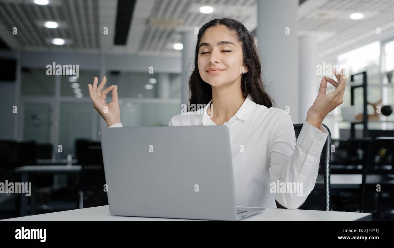 Overworked stressed woman office worker manager works on laptop feels ...