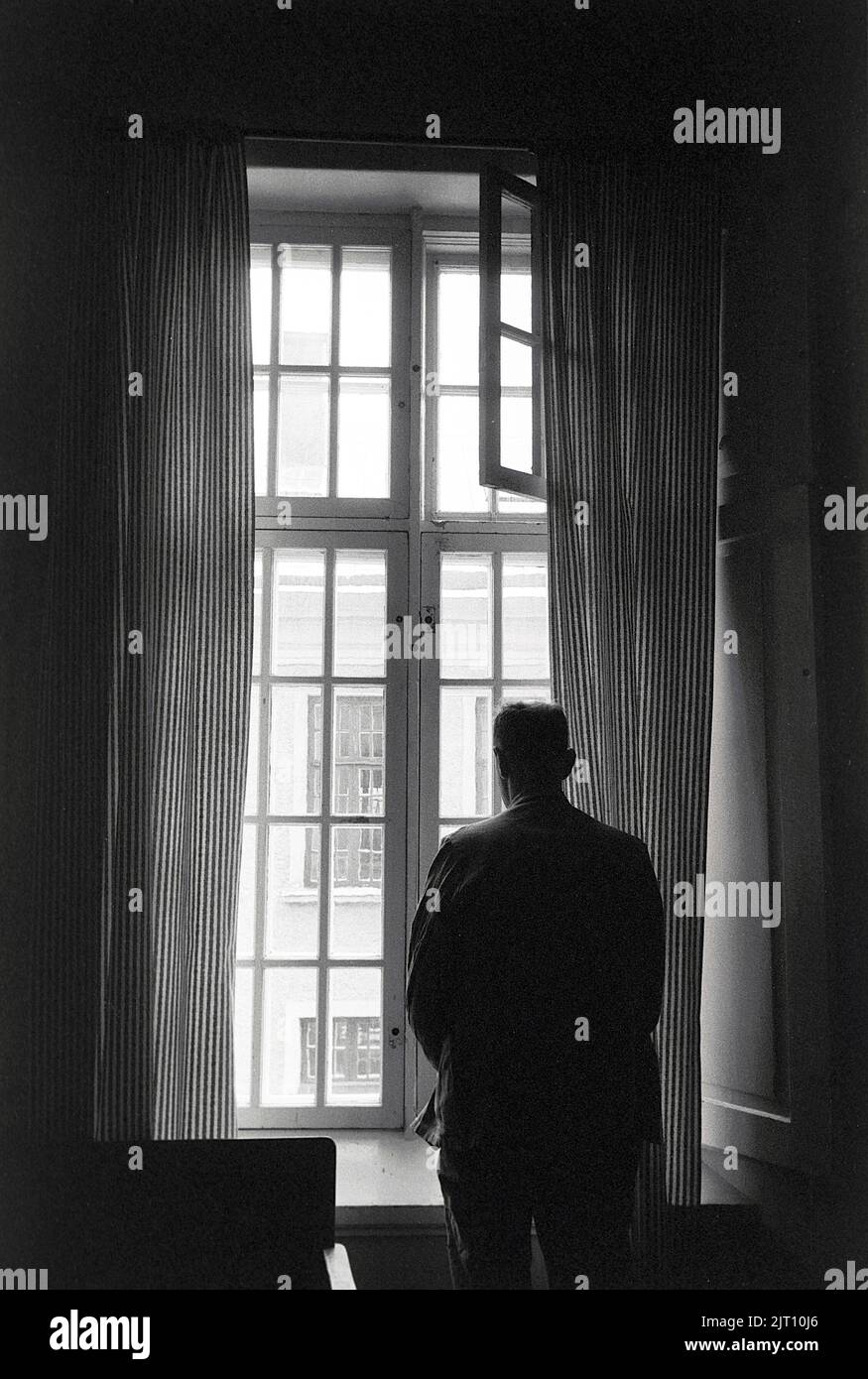 In the 1950s. An interior of a mental hospital where a patient is seen ...