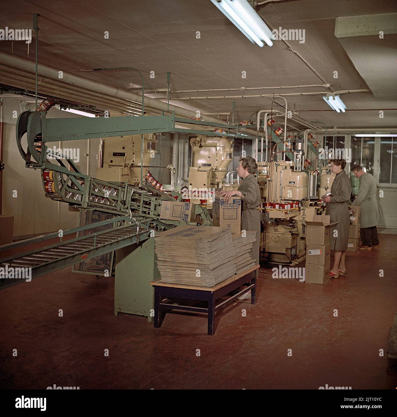 Coffee in the 1960s. Interior of a room where people are working with ...