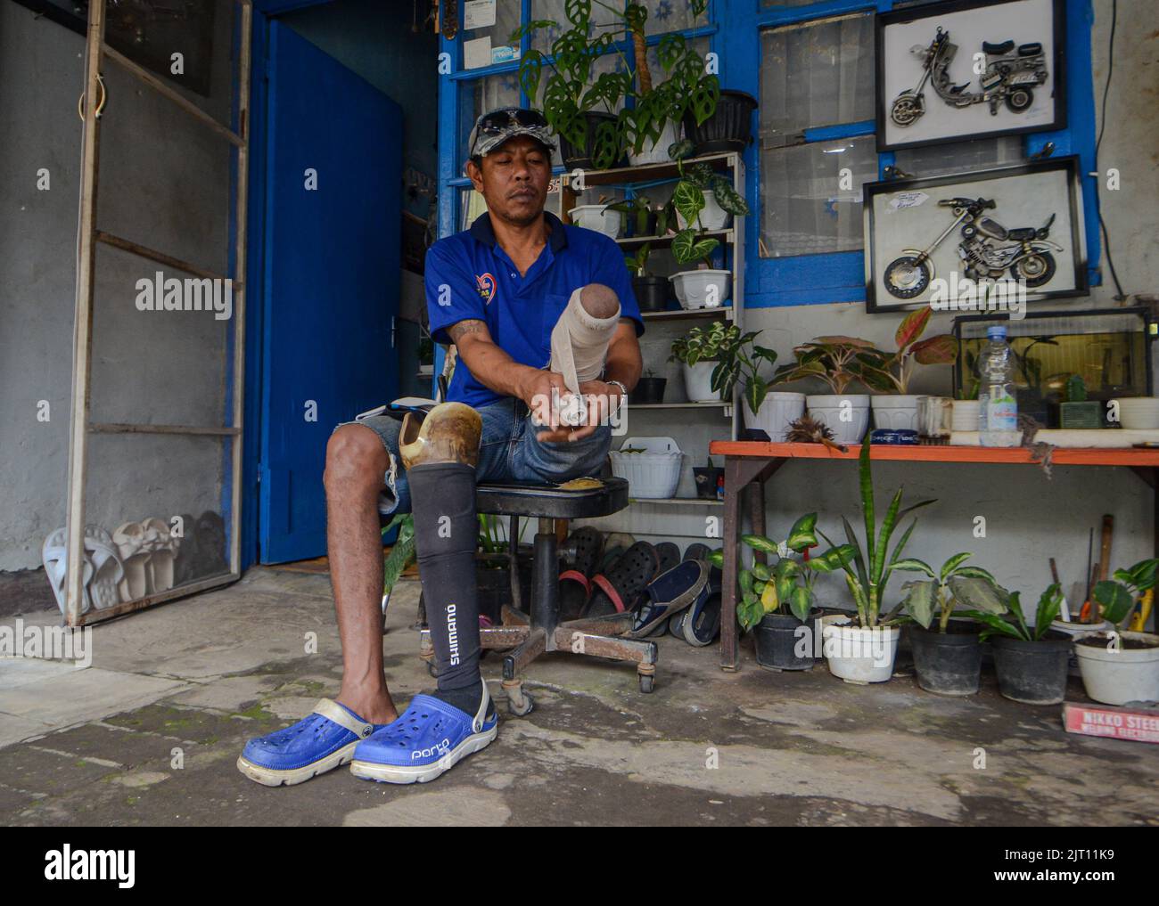 Malang, East Java, Indonesia. 11th Aug, 2022. Hariyanto (50) is a ...