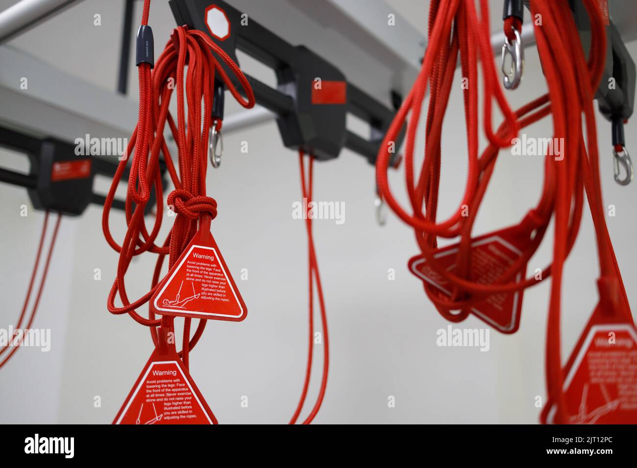 Red rope of suspension therapy system for rehabilitation and ...
