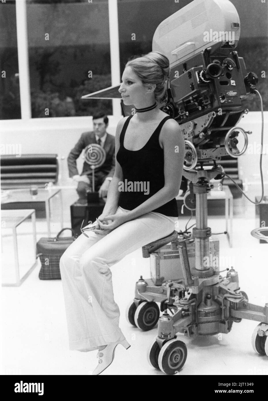 BARBRA STREISAND on set candid next to Movie Camera during filming of ...