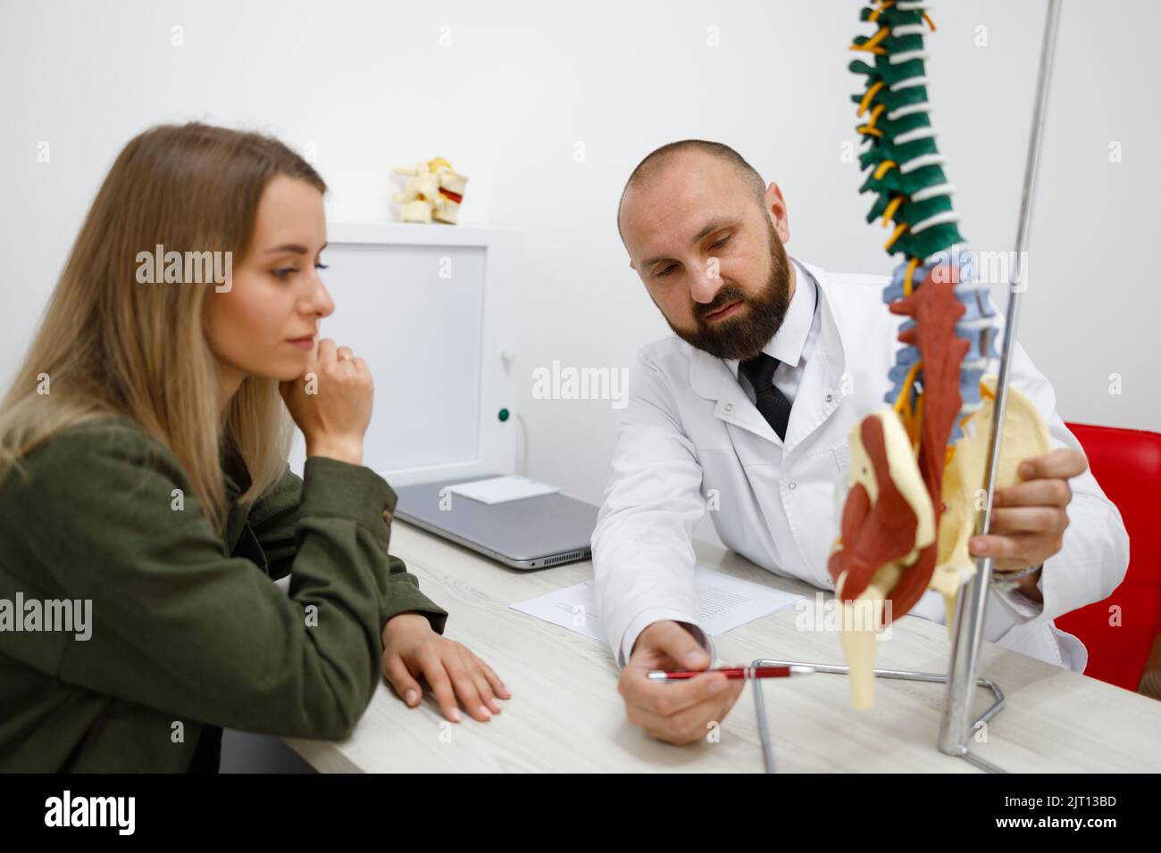 Male doctor pointing spine hi-res stock photography and images - Alamy
