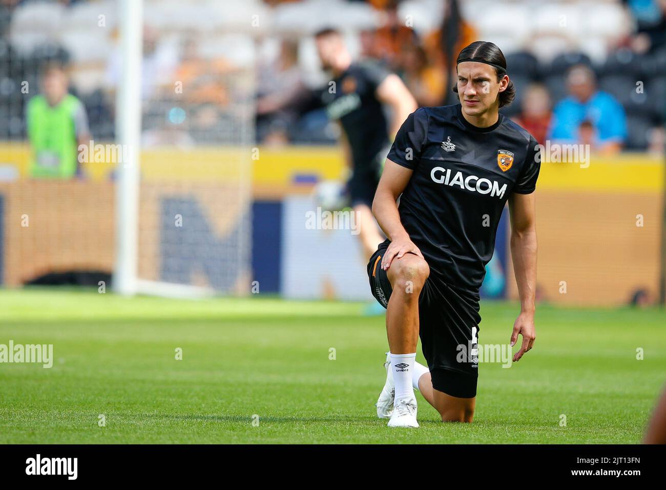 Hull, UK. 26th Aug, 2022. Alfie Jones #5 of Hull City warms up before ...