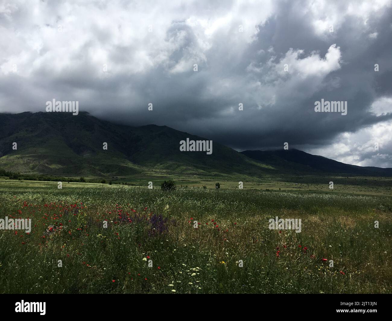 A scenic view of Gramoz mountain in a rural area in Albania in cloudy ...