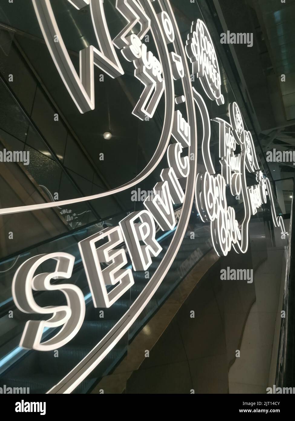 Neon signboards at Lafayette Galleries in Paris Stock Photo - Alamy