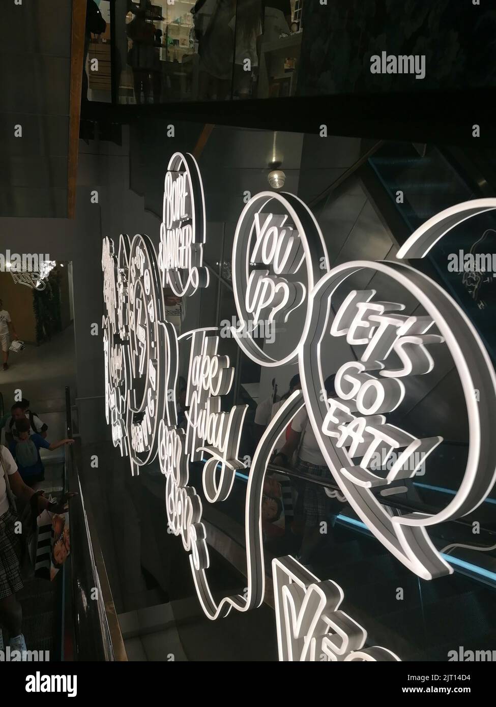 Neon signboards at Lafayette Galleries in Paris Stock Photo - Alamy