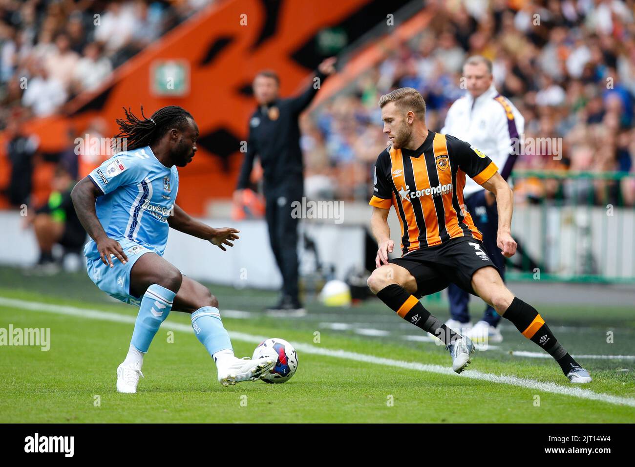 Callum Elder #3 of Hull City and Fankaty Dabo #23 of Coventry City ...