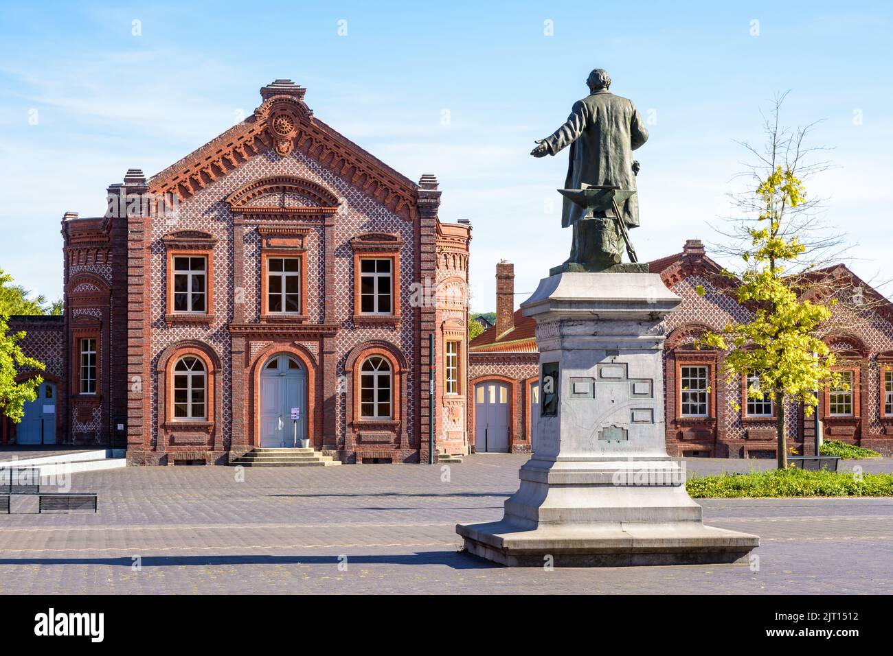 The statue to Godin faces the theater and school buildings of the ...