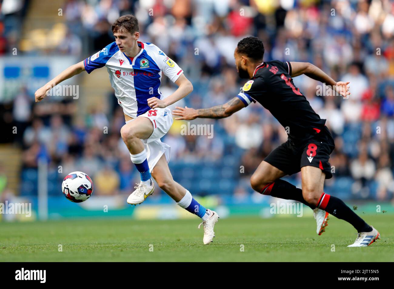 Blackburn Rovers' Tyler Morton and Stoke City's Lewis Baker in action ...