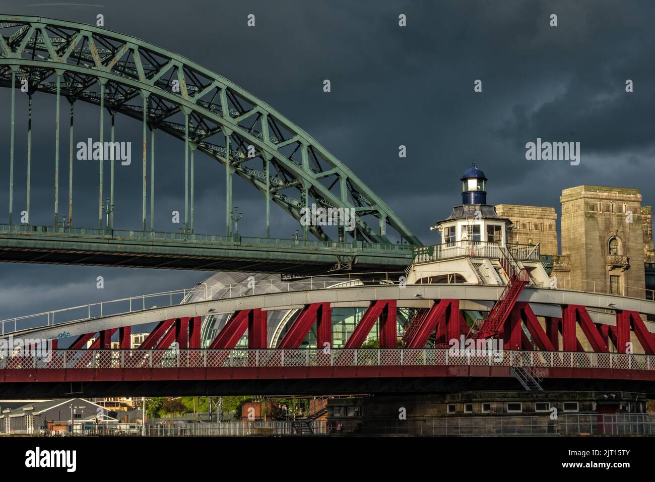 The Swing Bridge and Tyne bridge against with cloudy sky on a stormy ...