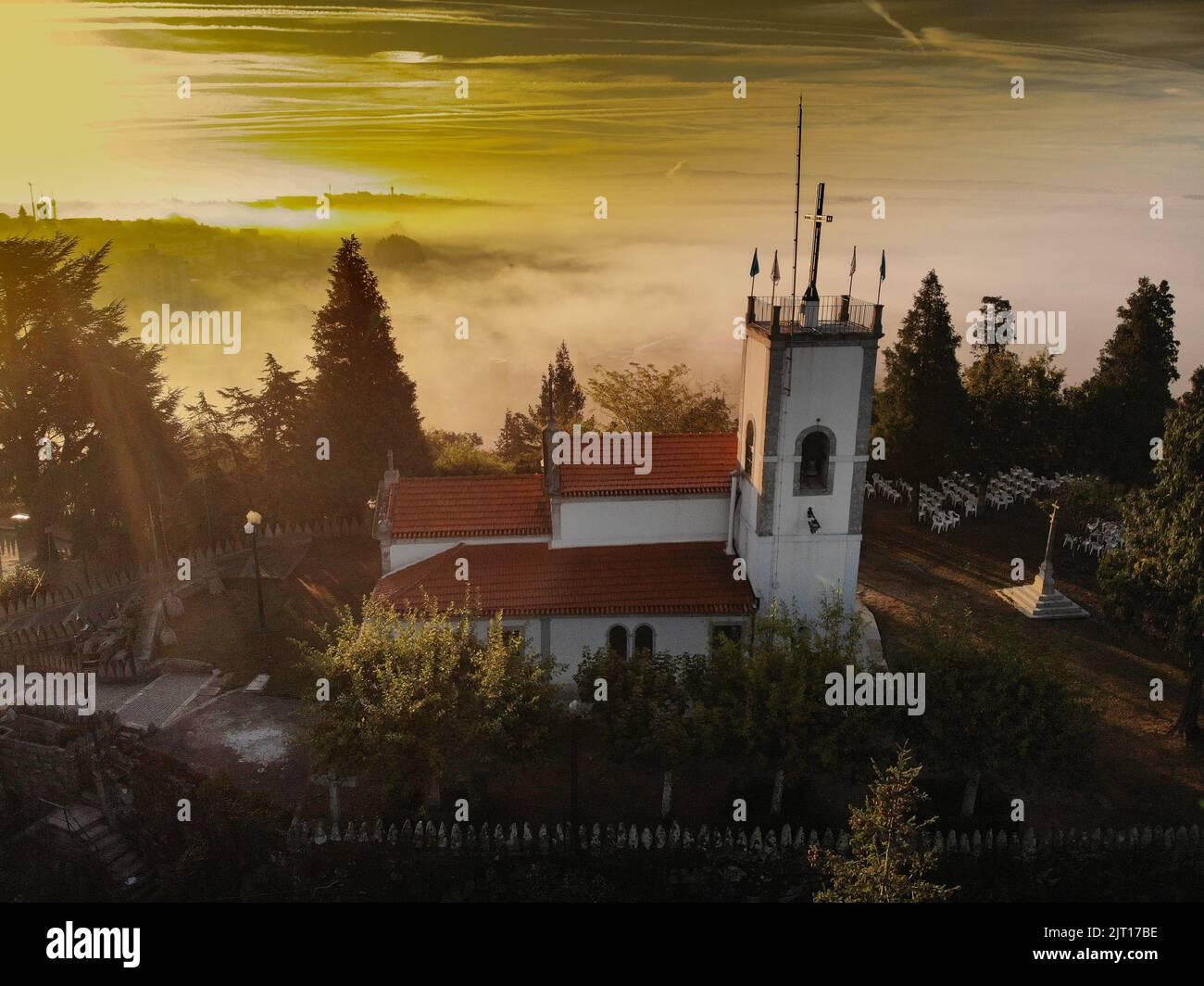 An aerial view of Church on top of the mountain Stock Photo - Alamy