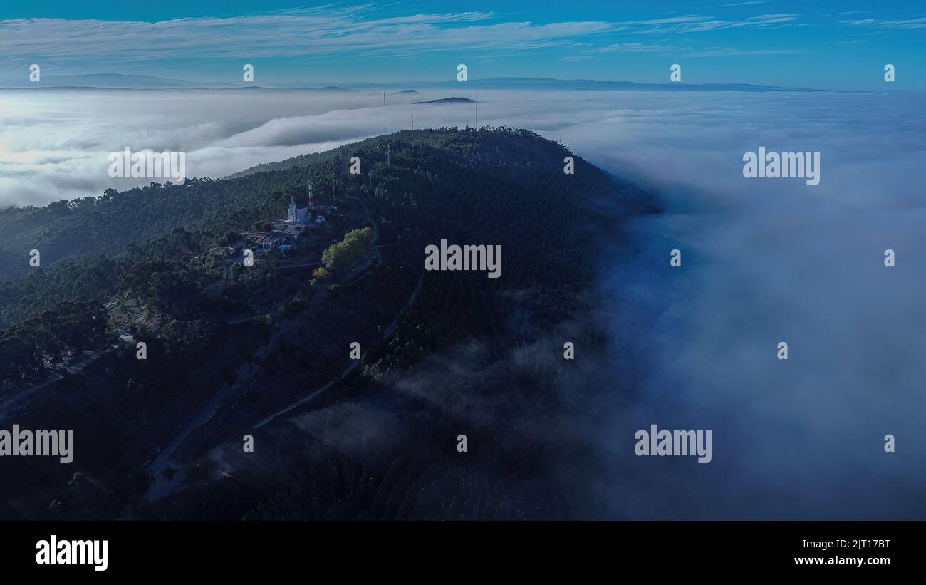 An aerial view of Church on top of the mountain Stock Photo - Alamy