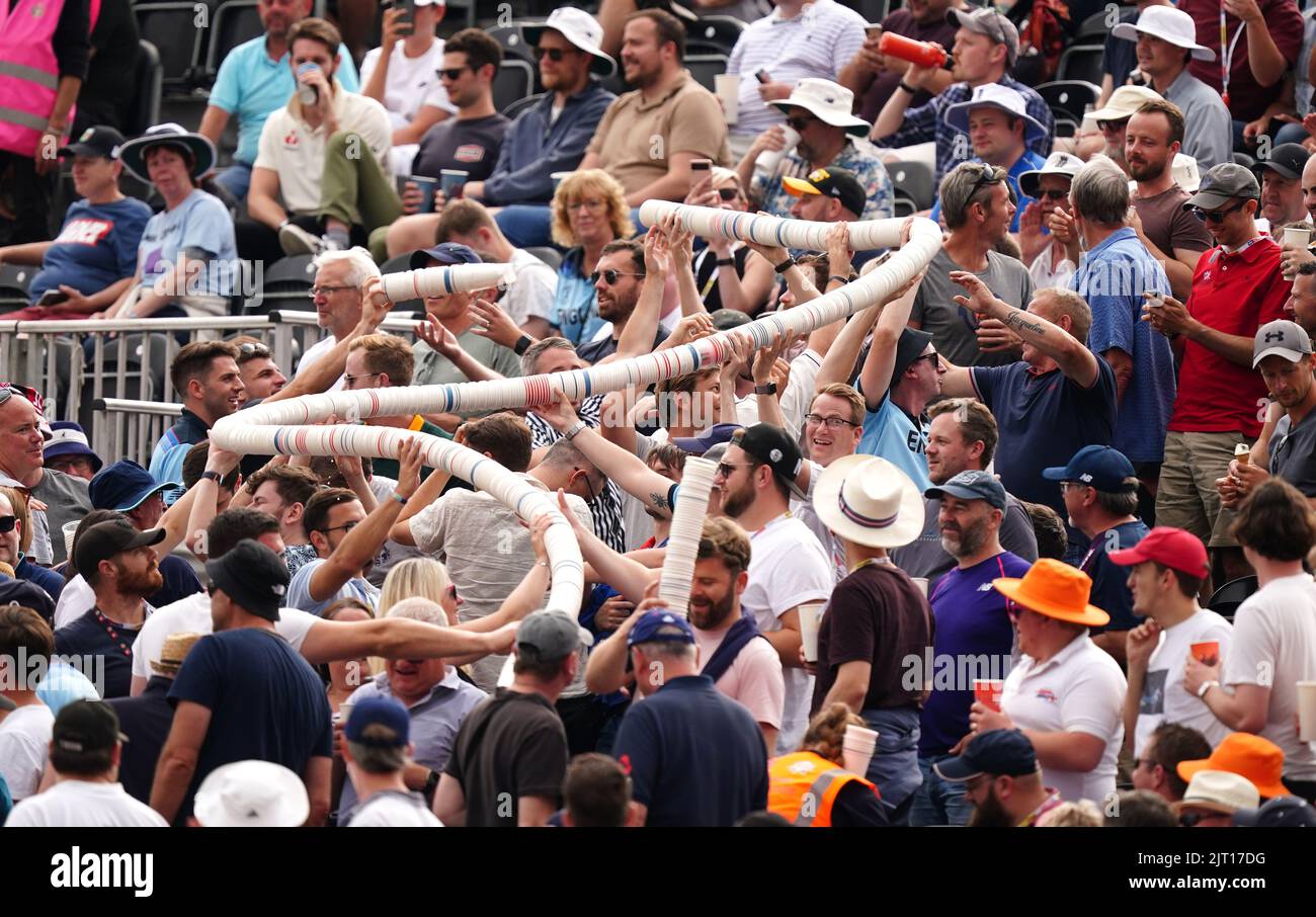England fans stack their used pint glasses during day three of the ...