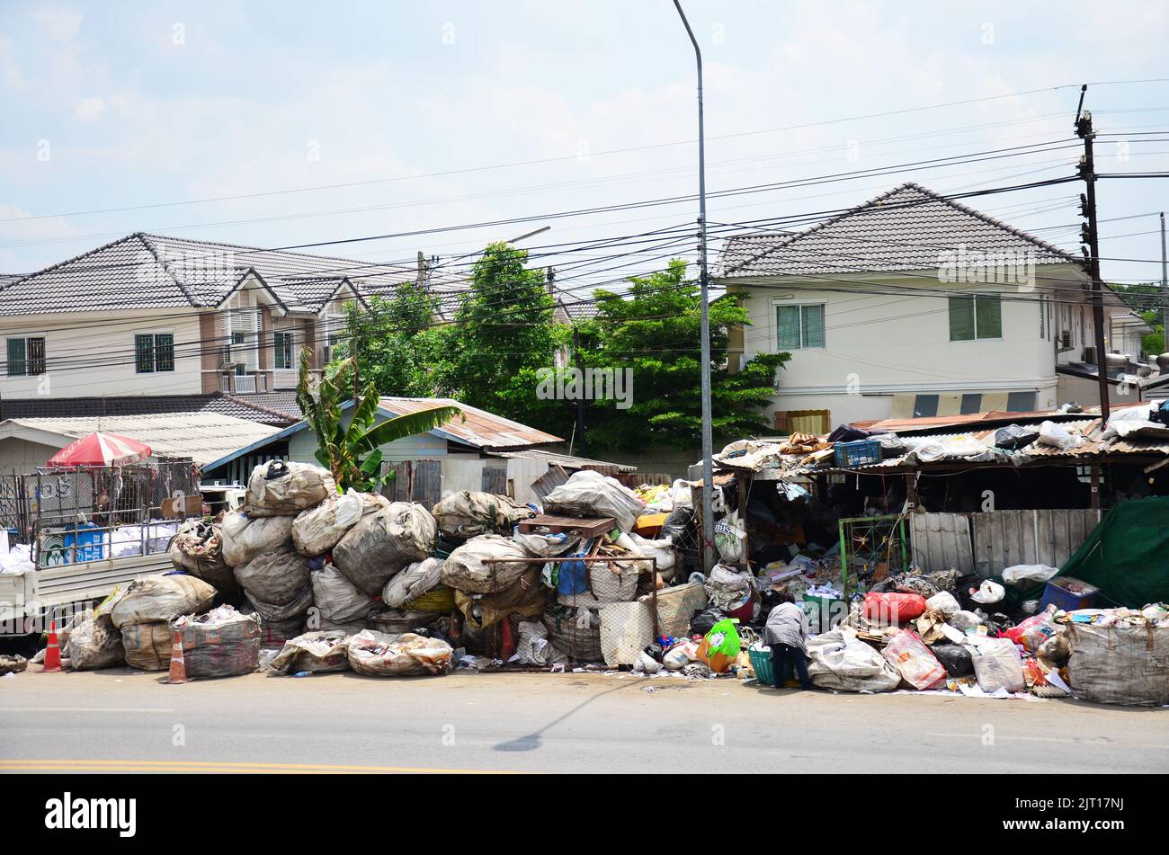 Bin area and thai people dropping waste and working separation sorting ...