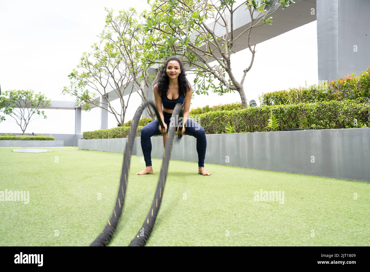 Athlete doing battle ropes hi-res stock photography and images - Alamy