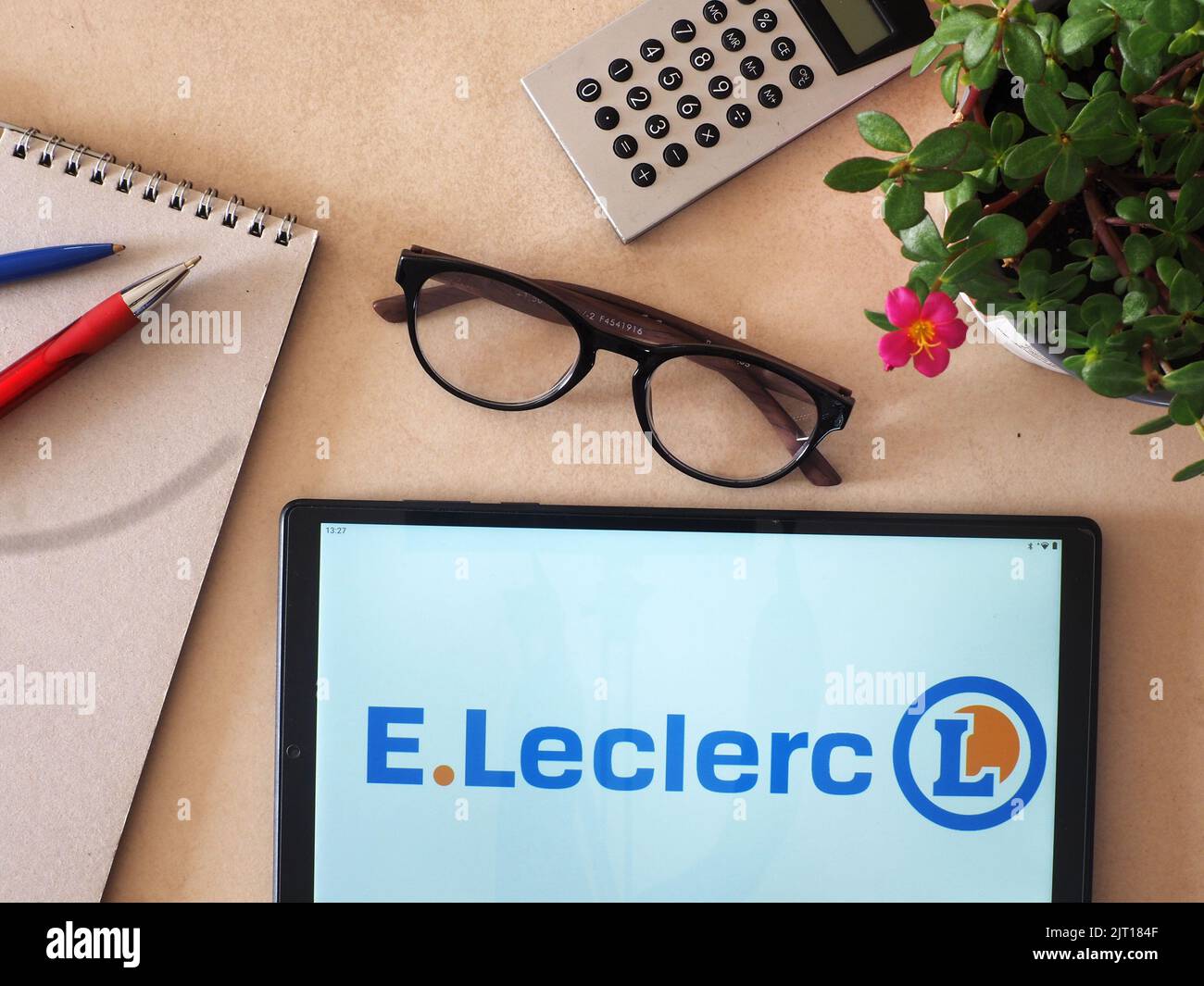 In this photo illustration, E.Leclerc logo seen displayed on a tablet ...