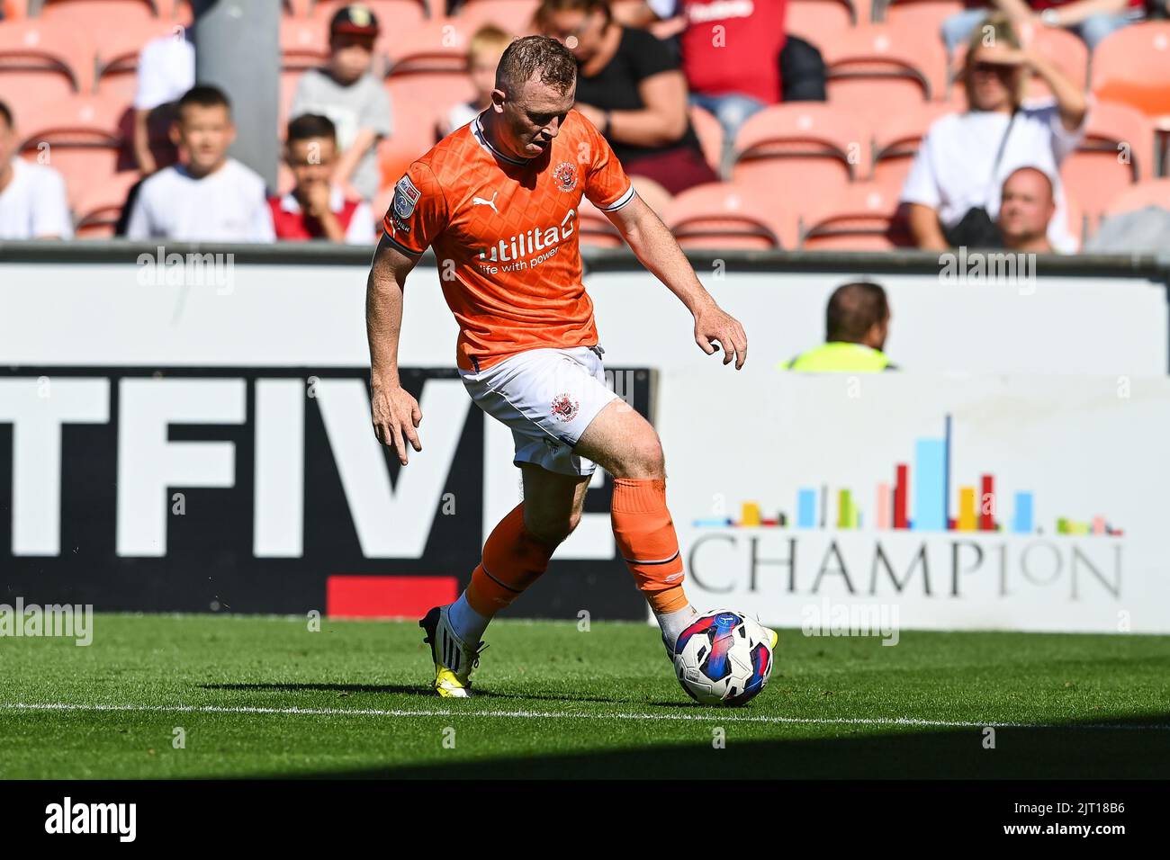 Shayne Lavery #19 of Blackpool makes a break with the ball Stock Photo ...