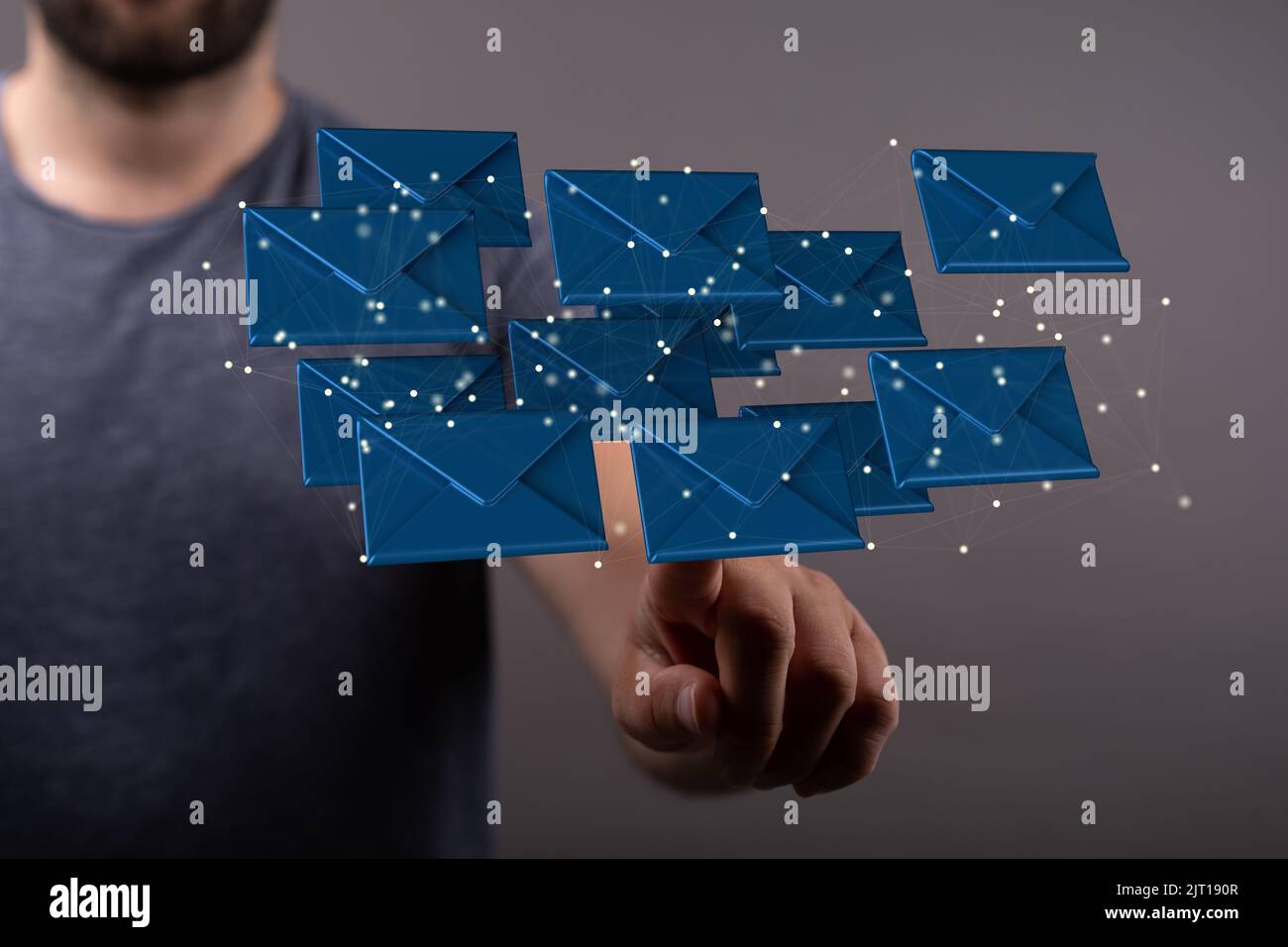 A 3D rendering of a businessman's hand tapping floating email icons Stock Photo - Alamy