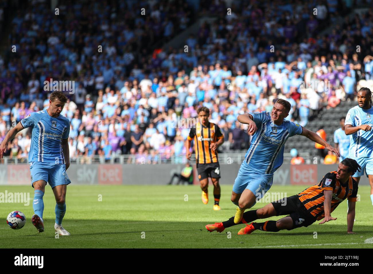 Hull, UK. 27th Aug, 2022. Jacob Greaves #4 of Hull City tackles Viktor ...