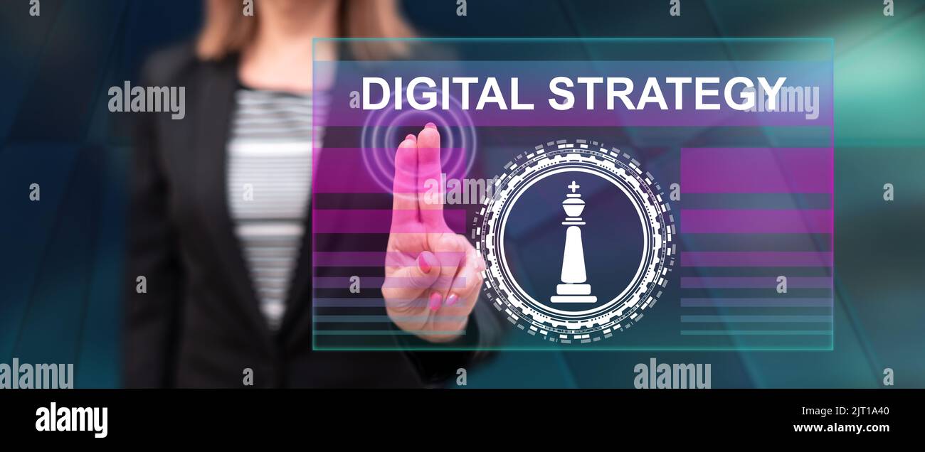 Woman touching a digital strategy concept on a touch screen with her ...