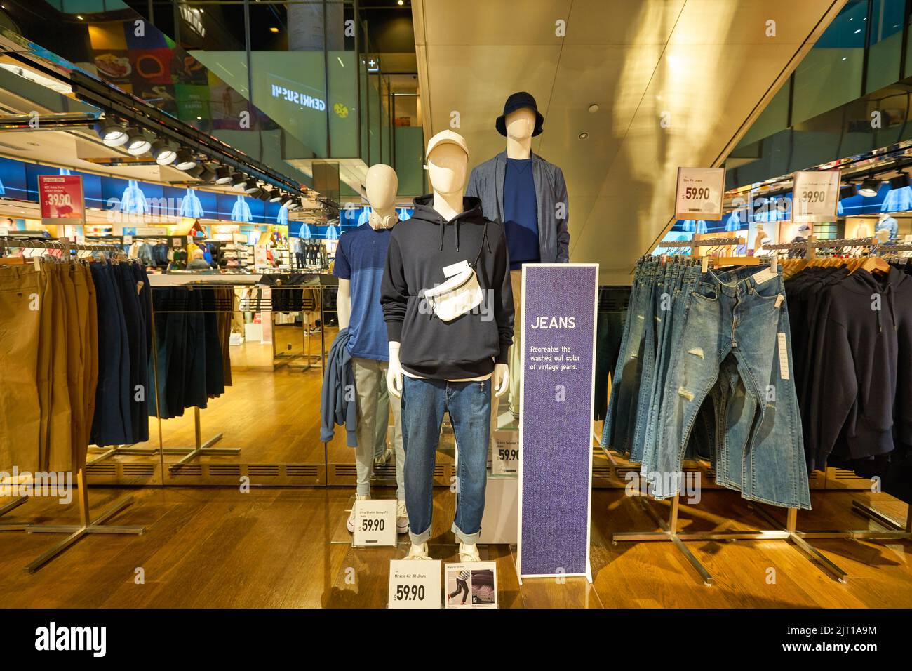 SINGAPORE - CIRCA JANUARY, 2020: interior shot of UNIQLO Orchard Central, Global Flagship Store ...