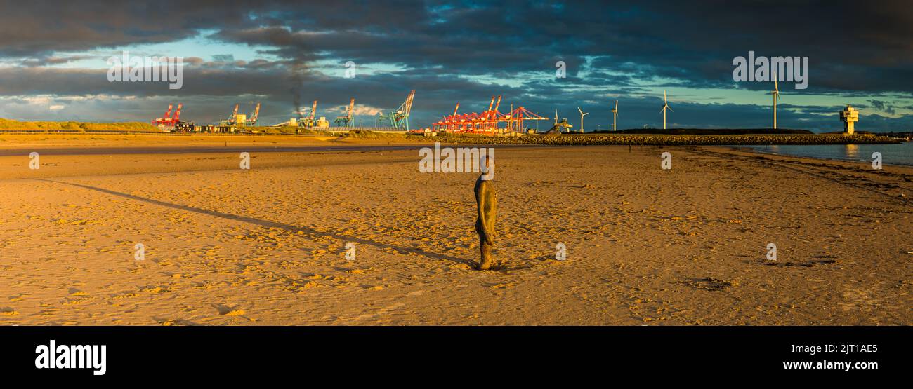 Panorama of Crosby beach including an Iron man with the backdrop of ...