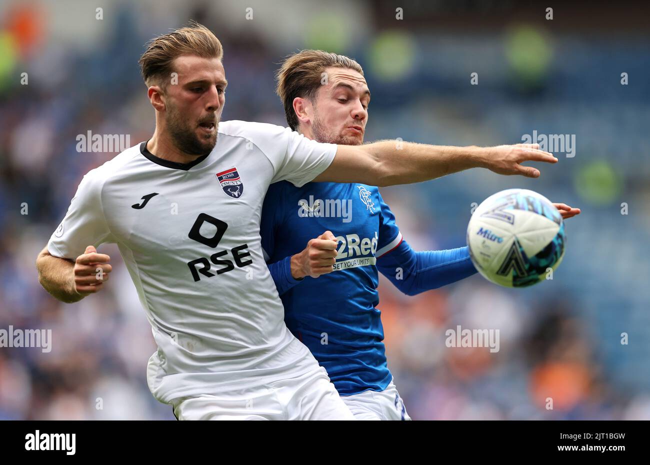 Rangers' Scott Wright (right) and Ross County's Ben Purrington battle ...